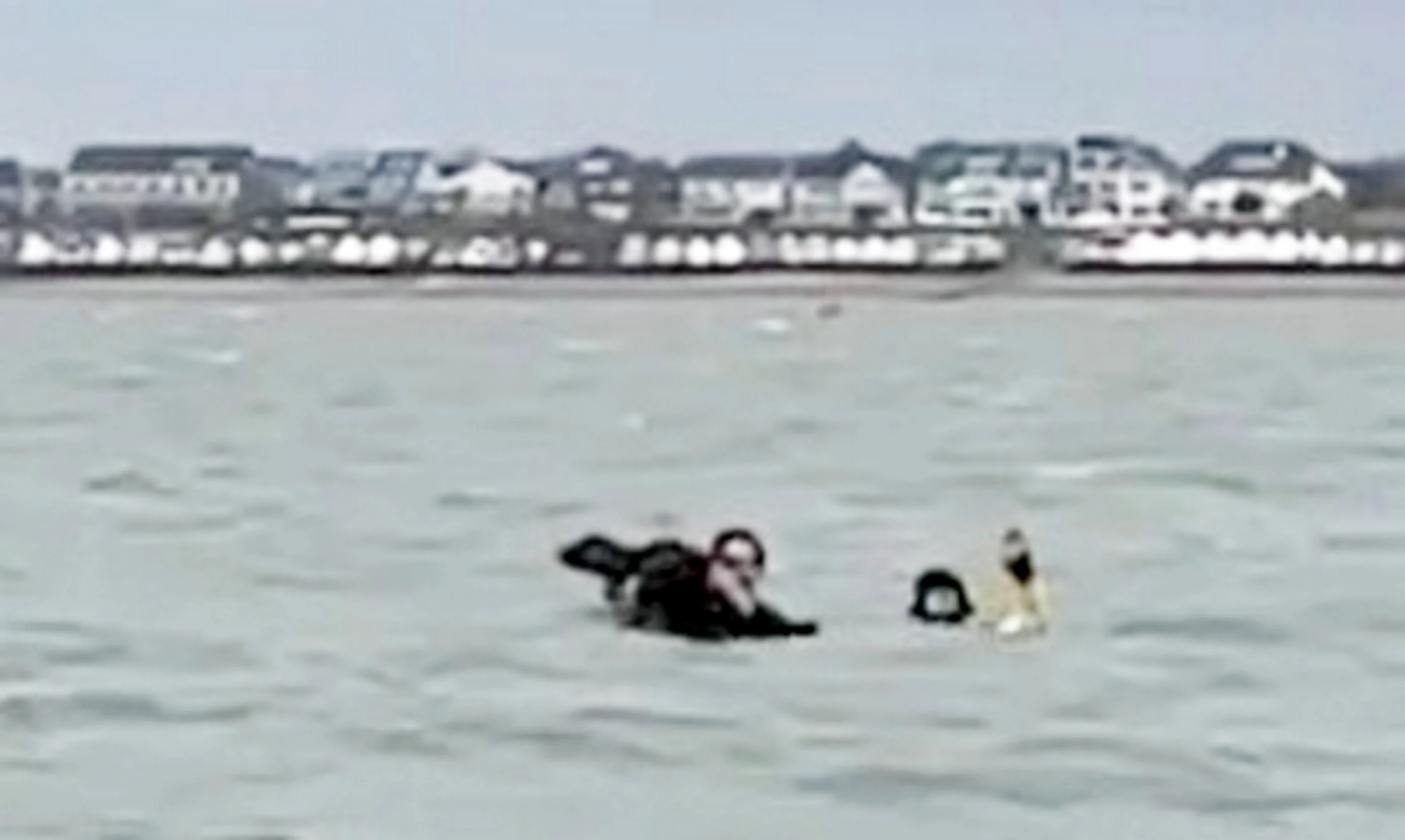 Moment two men rescued from drowning captured on camera | Leisure ...