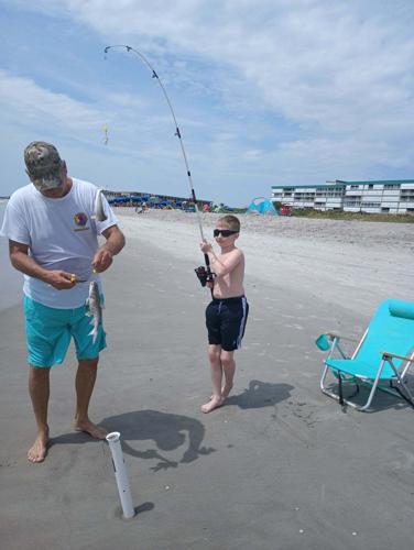 Creekside boy catches tiger shark during summer break | News ...
