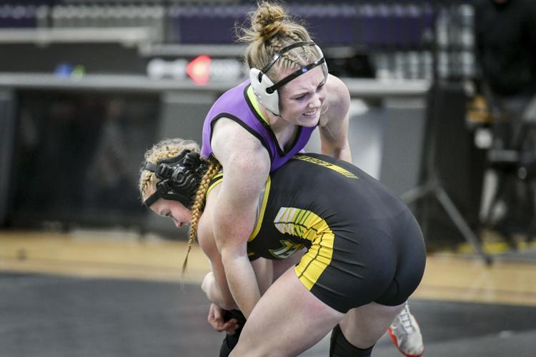 Five girls teams wrestle in Norwalk | Multimedia | indianola-ia.com