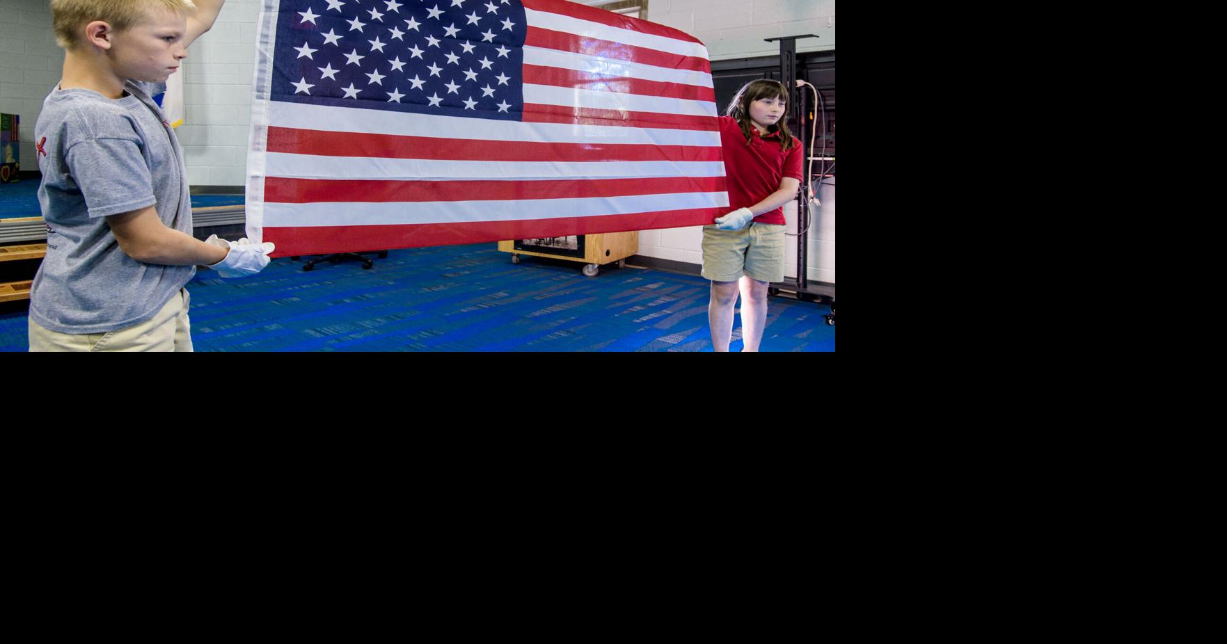Students learn flag folding | Multimedia | indianola-ia.com