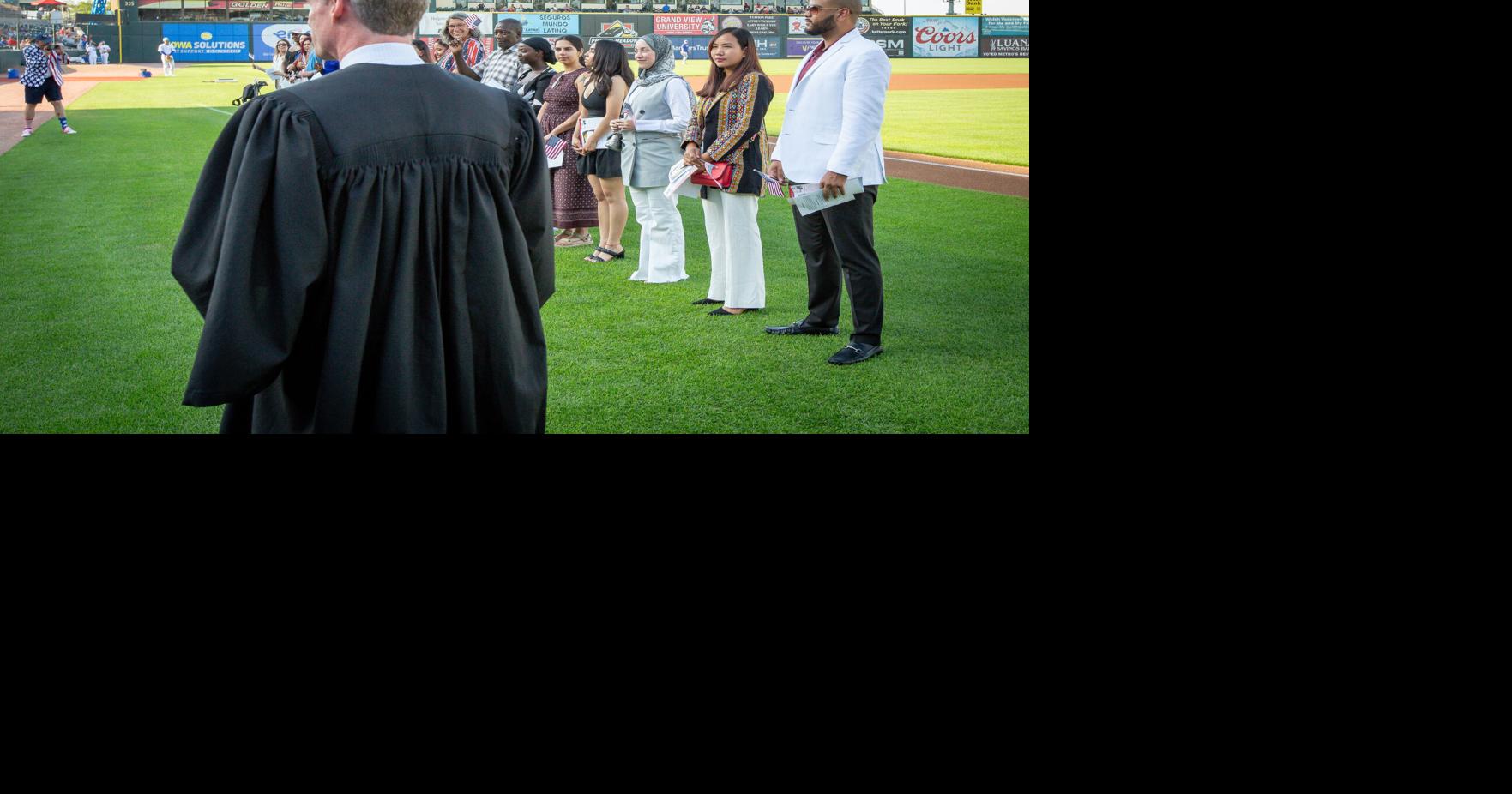 Simpson grad throws out first pitch, becomes citizen at I-Cubs ceremony ...
