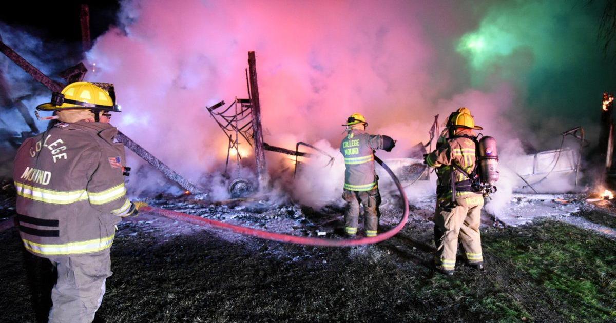 Firefighters fend off detached structure fire from damaging primary ...
