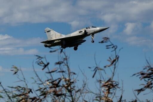 A Taiwan Air Force Mirage 2000 fighter jet takes off at Hsinchu Air ...