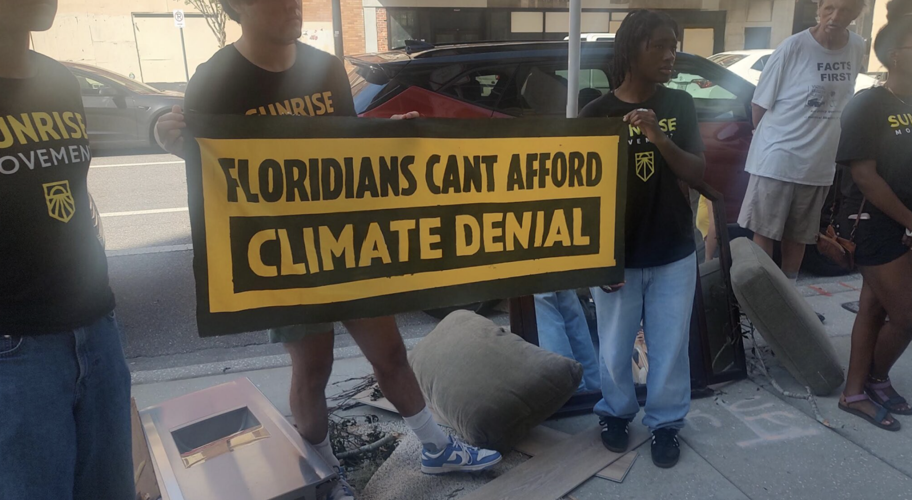 “No sir, it is climate change;” Sunrise Movement activists including ...
