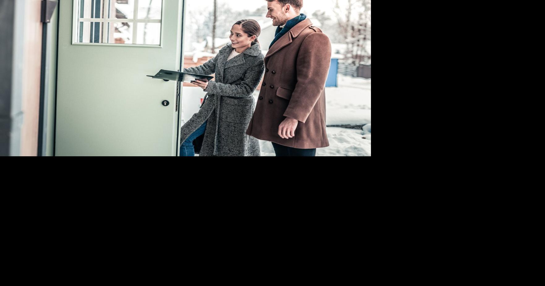 White front door. Beautiful experienced real estate agent opening white ...