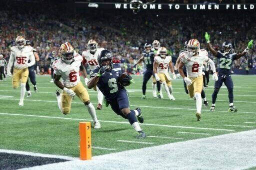 Kenneth Walker III runs in a touchdown for Seattle in the Seahawks ...