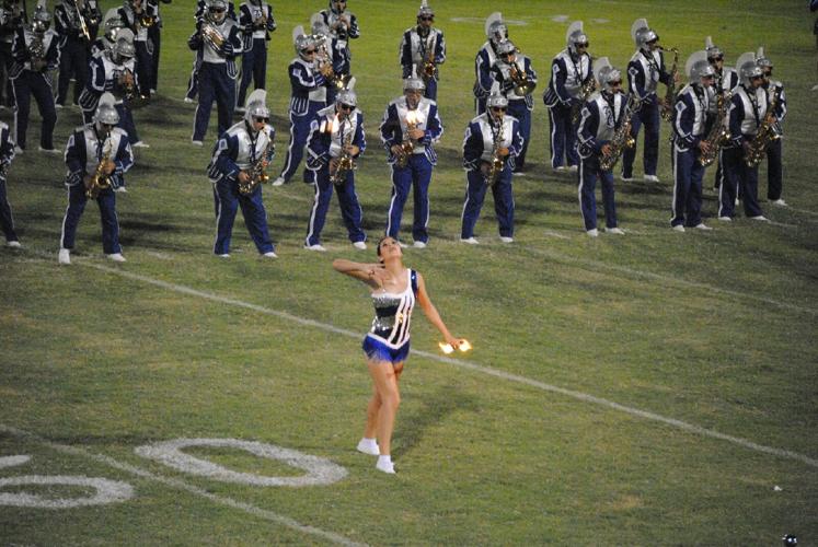 Majorettes perform big tricks at football games | Sports ...