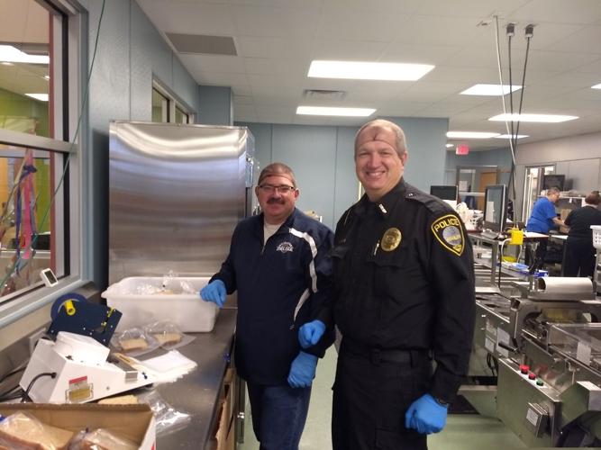 Area officers help prepare Meals on Wheels | Local News | iwantthenews.com