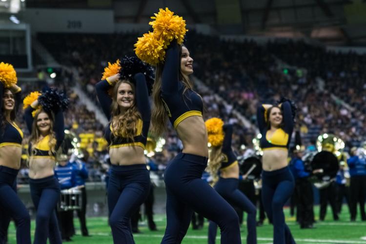 Keeping spirits high with NAU Cheer | Sports | jackcentral.org