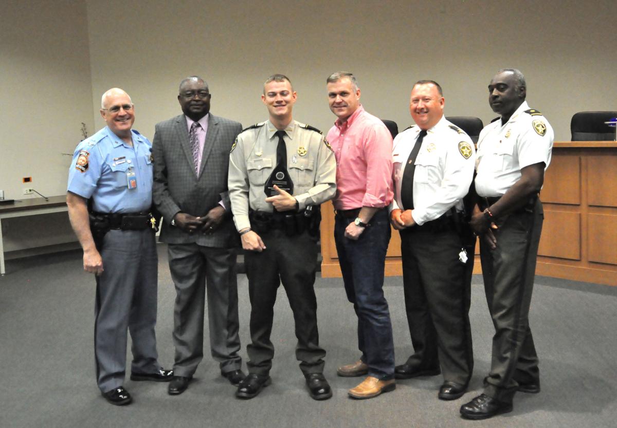 Butts County deputy honored for saving woman’s life after pursuit ...