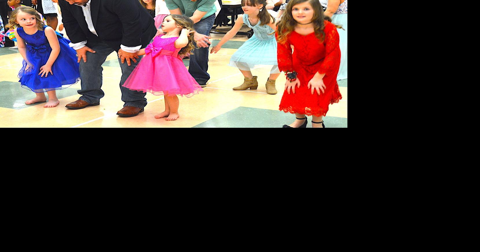 Daughtry Elementary brings Parisian theme to daddy-daughter dance ...