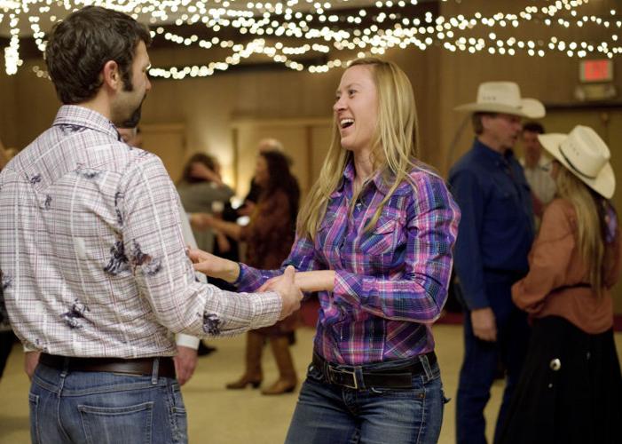 hold hands take two steps back