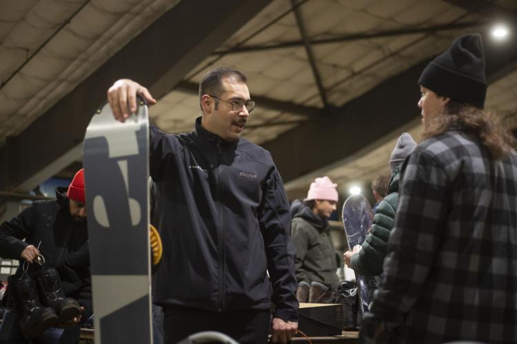 Skids and deal-chasers arrive before dawn at Ski & Gear Swap | The Hole ...