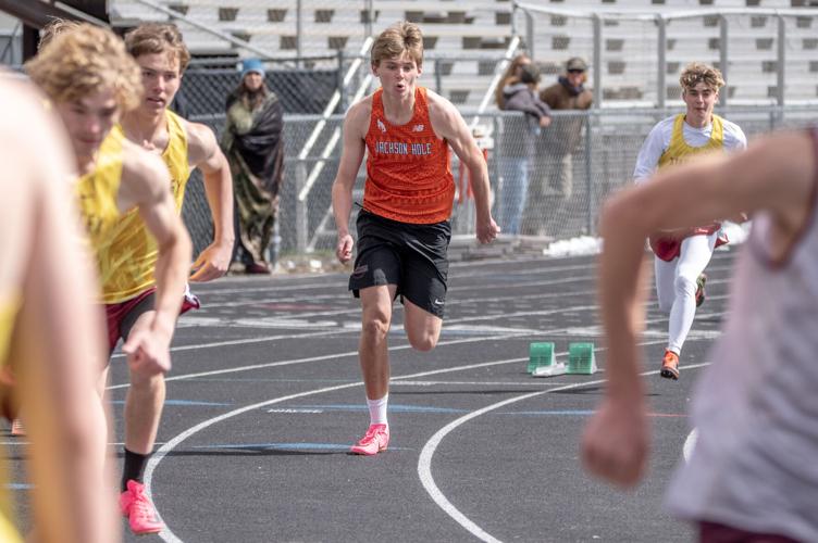 Track team closes with snowy home meet | High School Sports ...