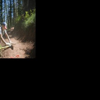 Volunteers dig trail-building work | Sports | jhnewsandguide.com