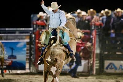 Saddle bronc rider OK after rodeo fall | Local | jhnewsandguide.com