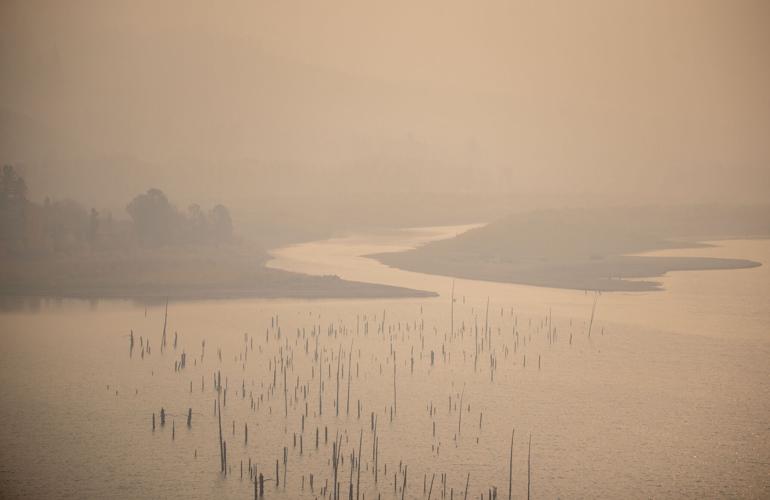 Firefighters wrapping homes, laying hose to protect Gros Ventre from ...