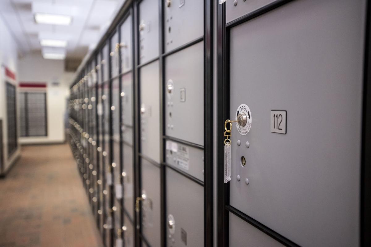 Postal Service installs package lockers to cut the hike | Business ...