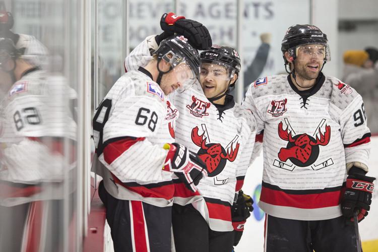 Moose buzz the Stingers | Sports Features | jhnewsandguide.com