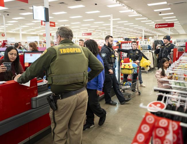 Shop with a cop hits Town Square | Features | jhnewsandguide.com