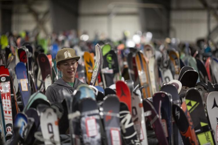 Skids and deal-chasers arrive before dawn at Ski & Gear Swap | The Hole ...