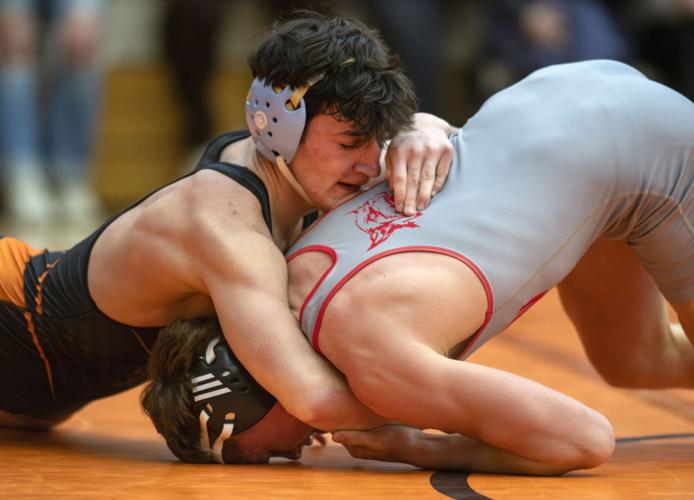 Wrestlers stick together, eye strong finish | High School Sports ...