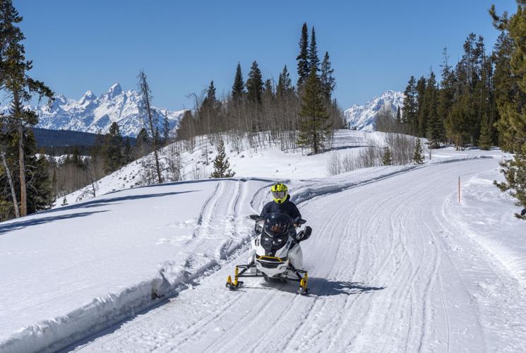 On Yellowstone's border, electric snowmobiles whirr — but don't brap ...