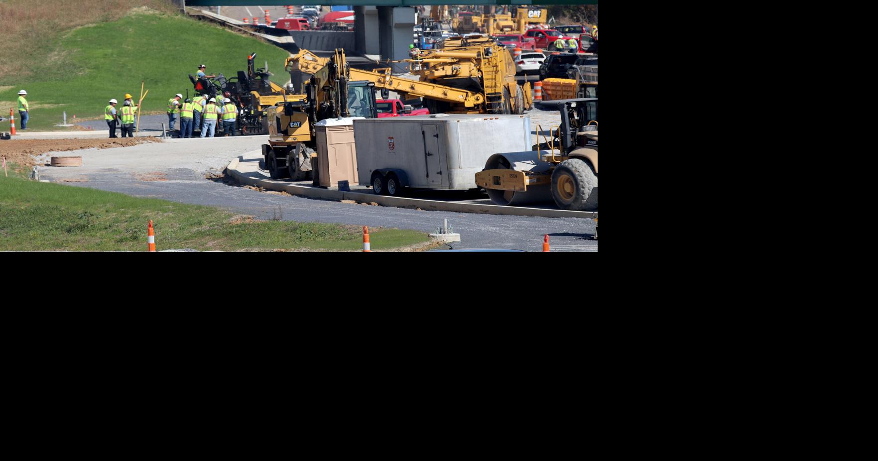 Exit 17 work ongoing with workers laying asphalt | News ...