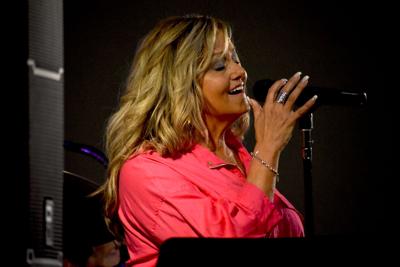 Local singer signs recording, publishing contract with music company ...