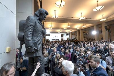 Hello, I'm Johnny Cash's statue: A monument to the singer is unveiled ...