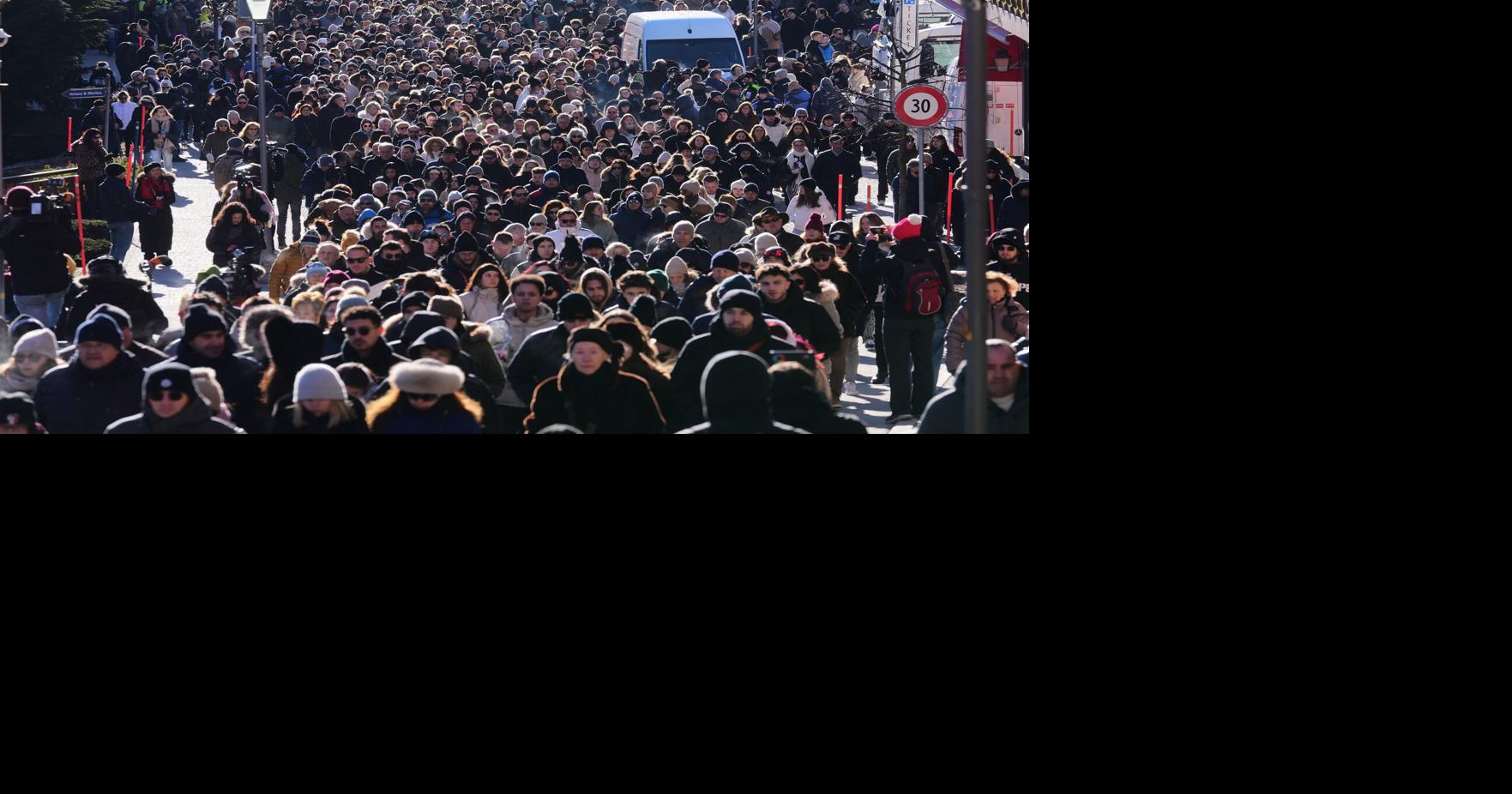 Hundreds march in silence to honor victims of Swiss bar fire that left ...