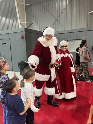 Families enjoy annual Pizza with Santa event at Civic Center | Journal ...