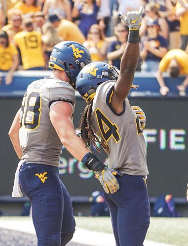 Taking it on the run: Mountaineers’ high-flying offense anchored by ...