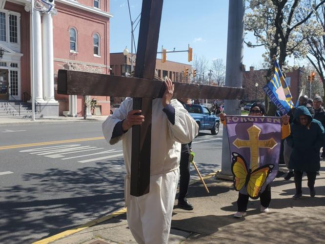 Christians mark Good Friday with annual Cross Walk | Journal-news ...