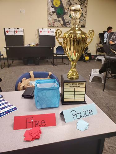 Blood drive pits local police against firefighters for charity ...