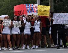 Forsyth County students stage walkout to protest job cuts