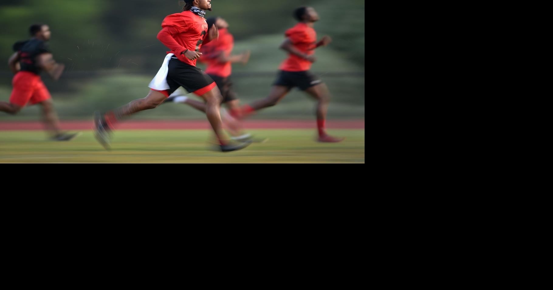 Dew sweepers: WSSU hits football practice field early Monday morning