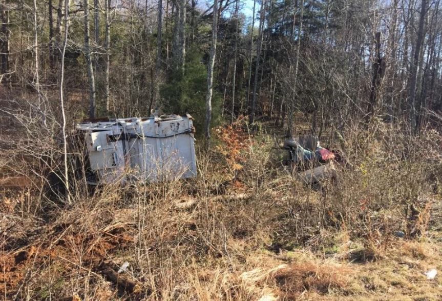 Driver and passenger critically injured in garbage truck crash in ...