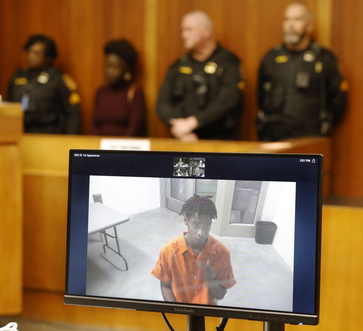 Teen charged with death of GPD officer responds to judge