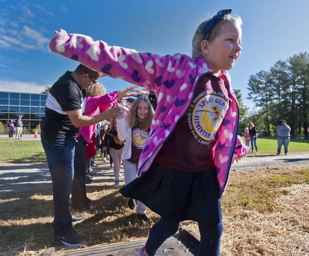 Speas Global Elementary students get new $75,000 playground from HGTV ...