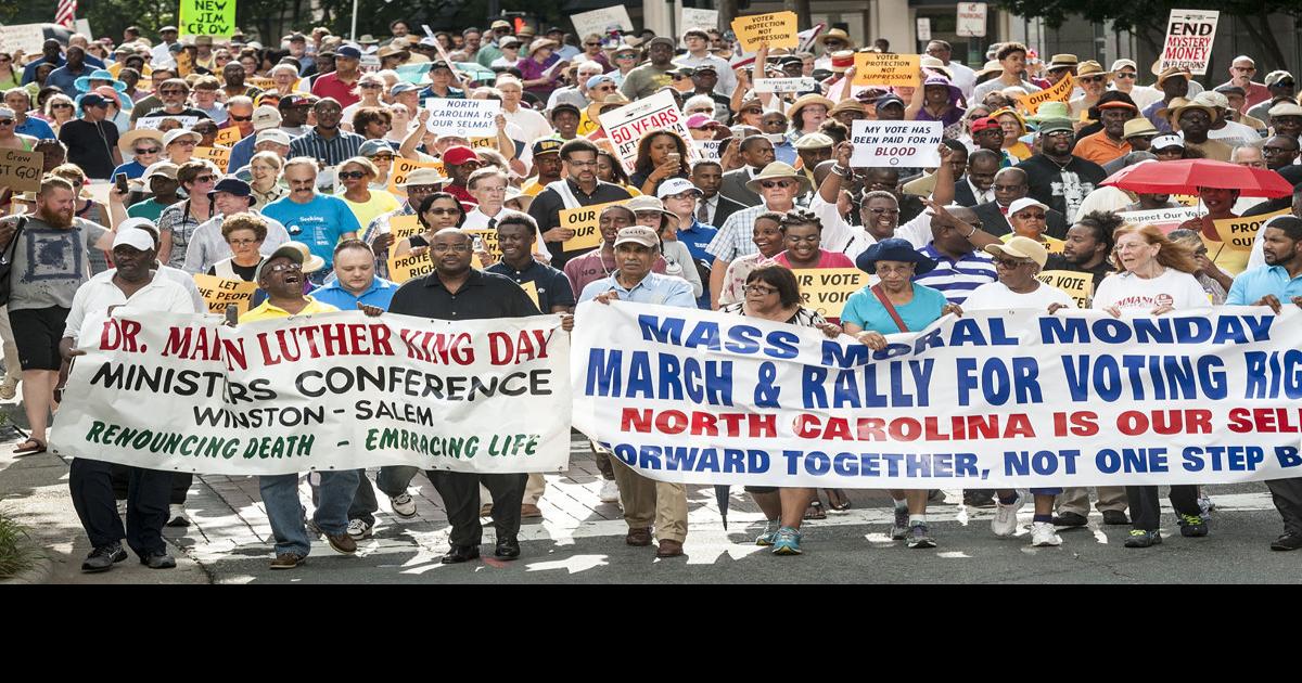 Thousands march through downtown to protest law