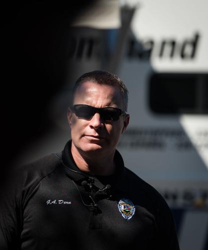 About 120 law enforcement officers and local residents knock on doors ...