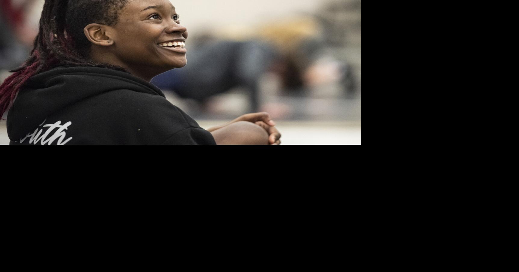 Tyashia Cleveland mixes it up for the Reagan wrestling team