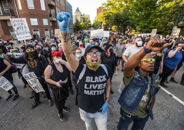Photos: Protests continue in Greensboro Sunday