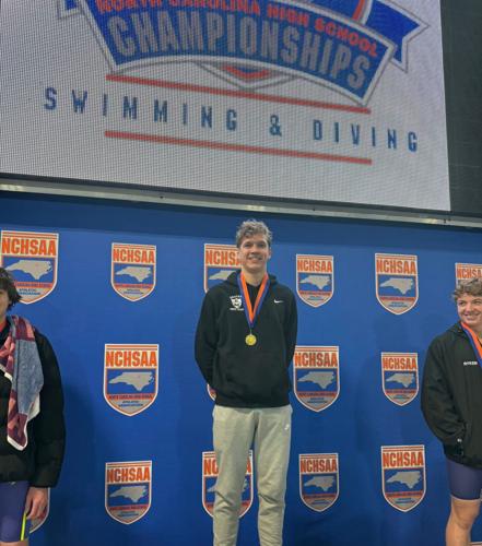 Tyler Burton wins 100-breaststroke state title for Reagan