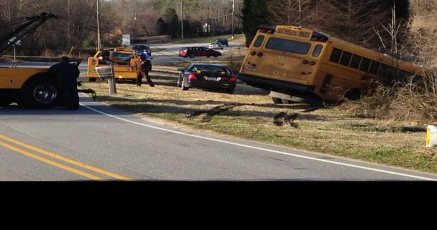 School bus goes into ditch after swerving to avoid car