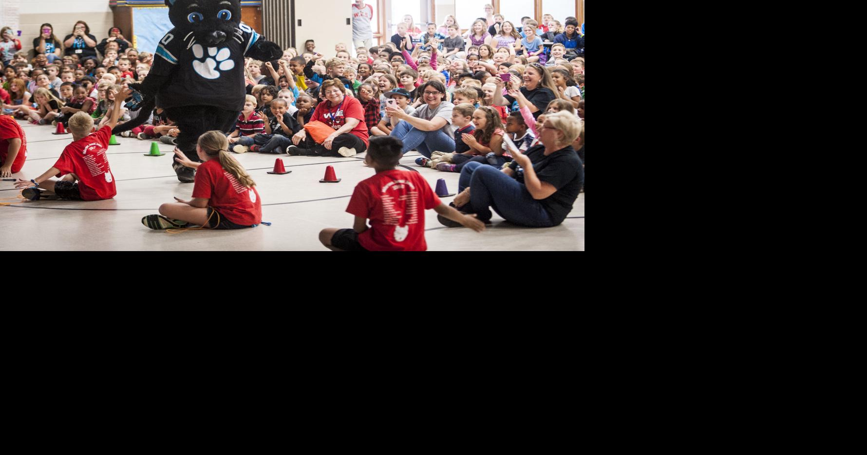 Carolina Panthers' Sir Purr surprises Walkertown Elementary students