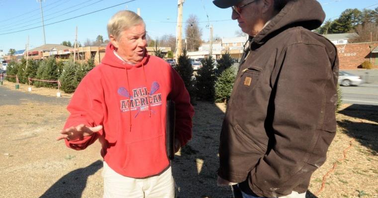 Volunteers restore annual Christmas tree distribution