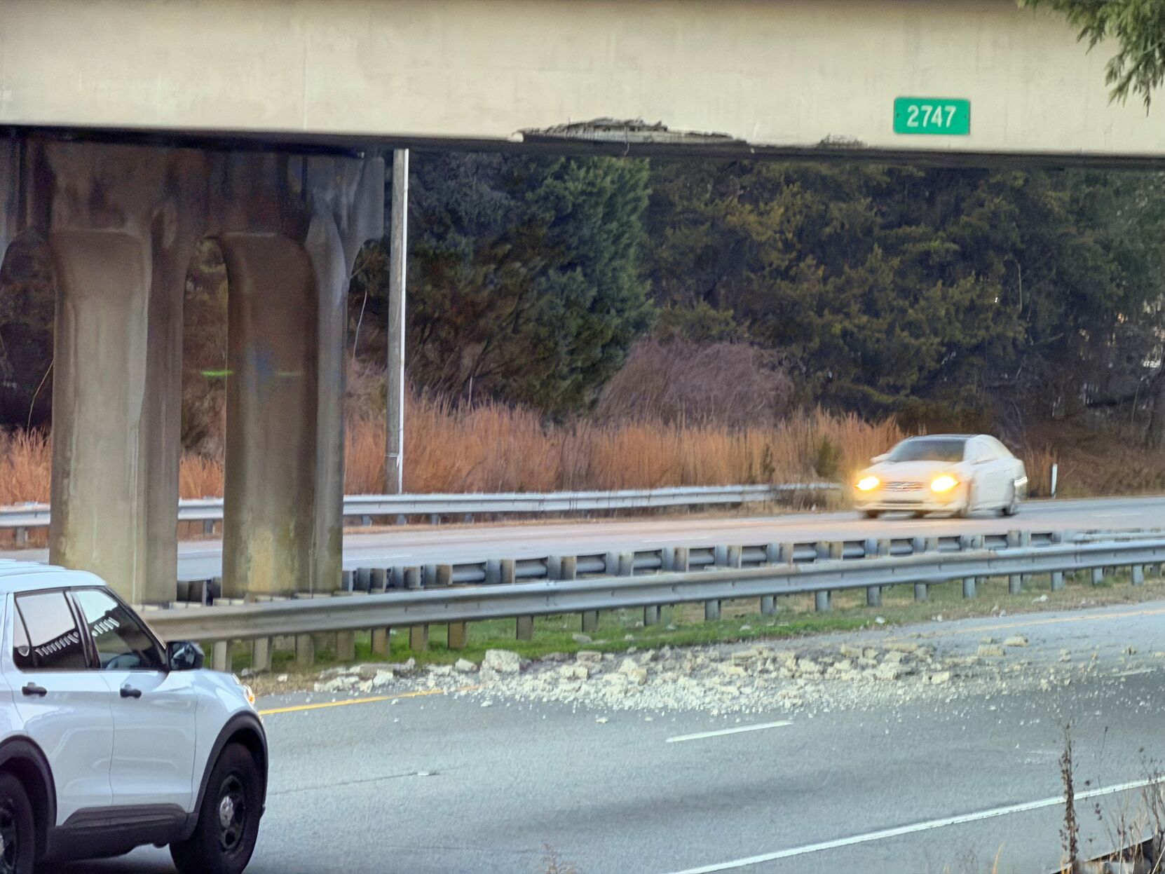 Winston-Salem bridge shut down after car hits it, causing concrete to ...