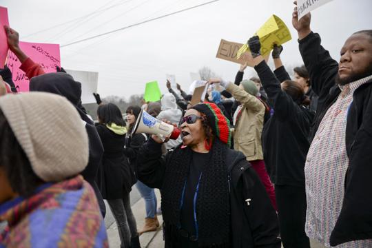 Protesters line Hanes Mall Boulevard